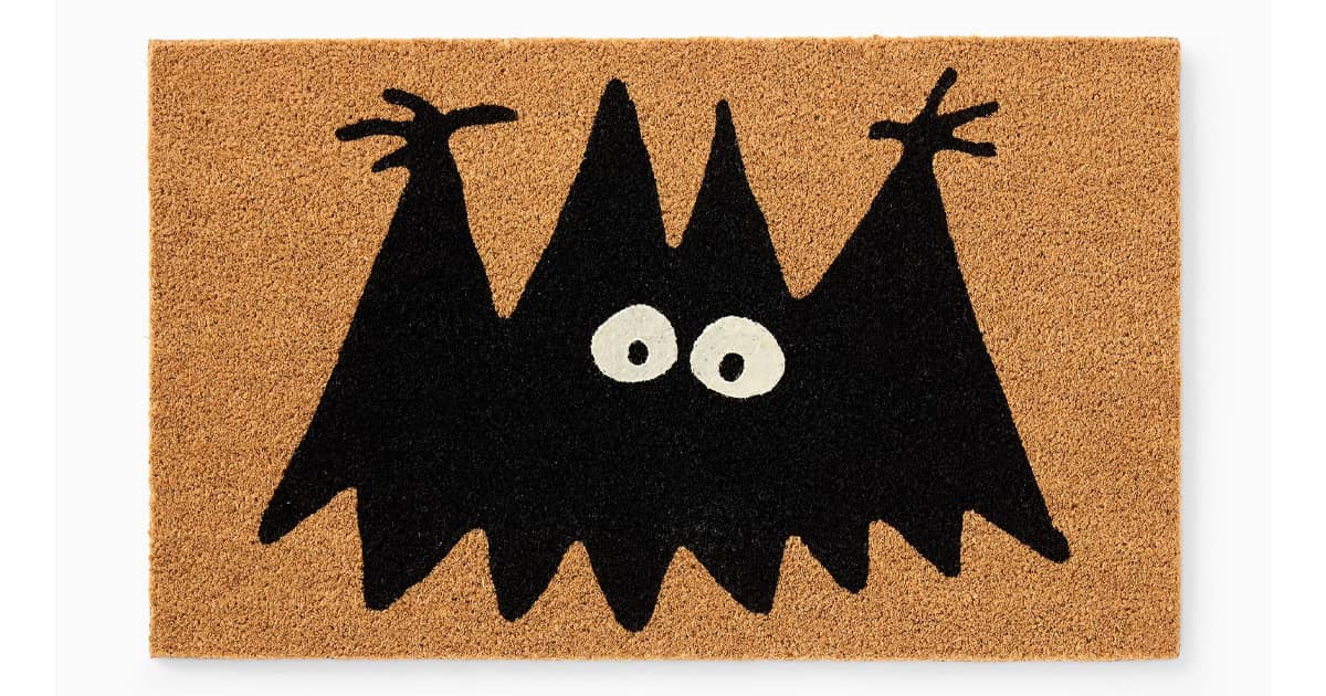 Whimsical Black Bat Doormat With Glow-in-the-Dark Eyes | The Green Head